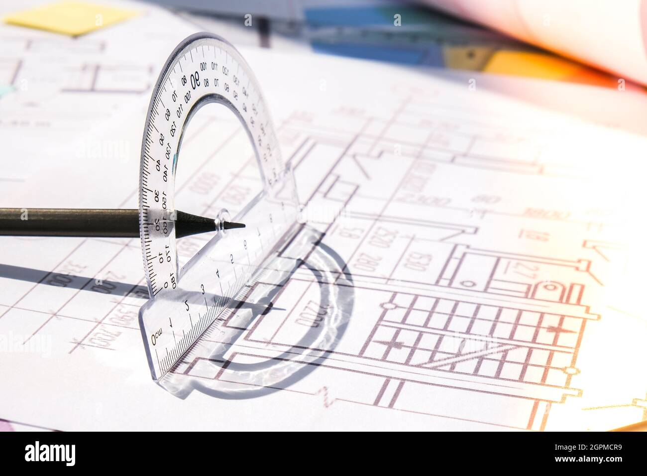 A pencil with a protractor. Architectural Project drawings with tools ...
