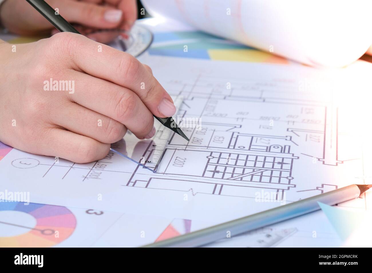 Hands use pencil with a protractor. Architectural Project drawings with ...