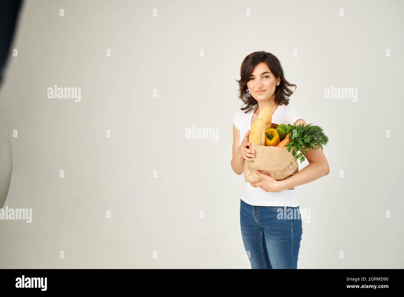 pretty woman with supermarket delivery service package Stock Photo - Alamy