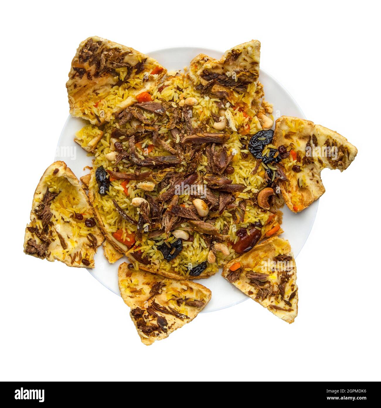 Traditional oriental pilaf with meat in a plate on a white background ...