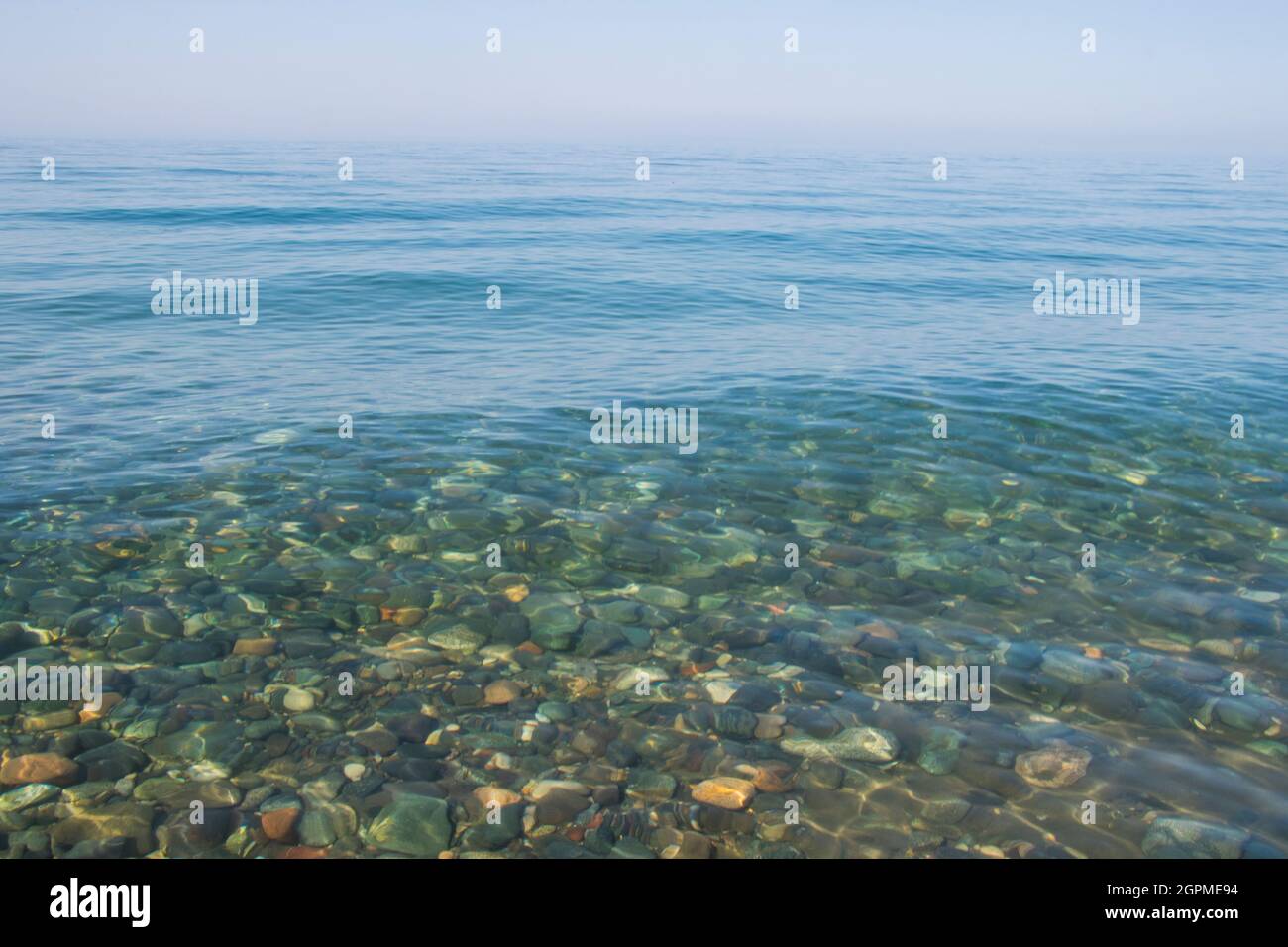 Stones in clear water of sea, water and stones background Stock Photo ...