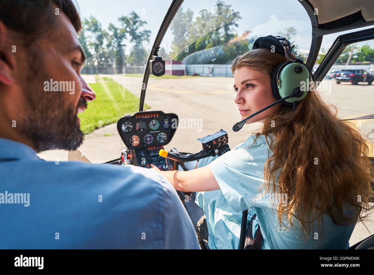 Female student pilot taking aviation lesson with private tutor Stock ...