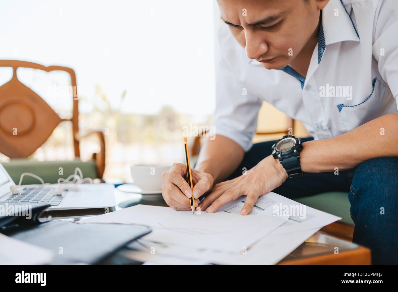 Administrator businessman making report, calculating balance. Business ...