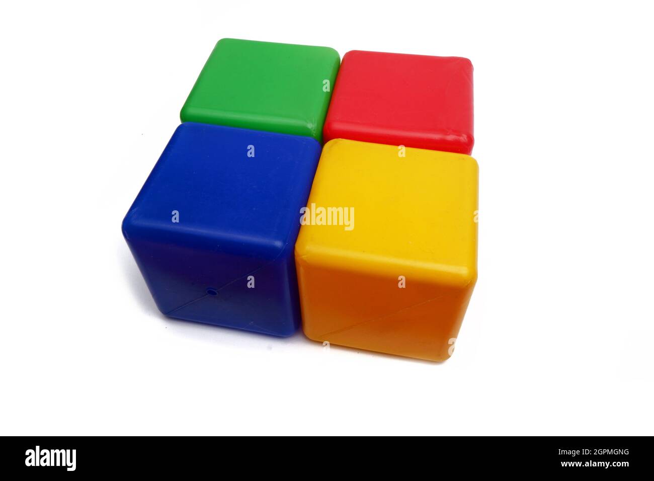 children's multicolored plastic cubes isolated on a white background ...