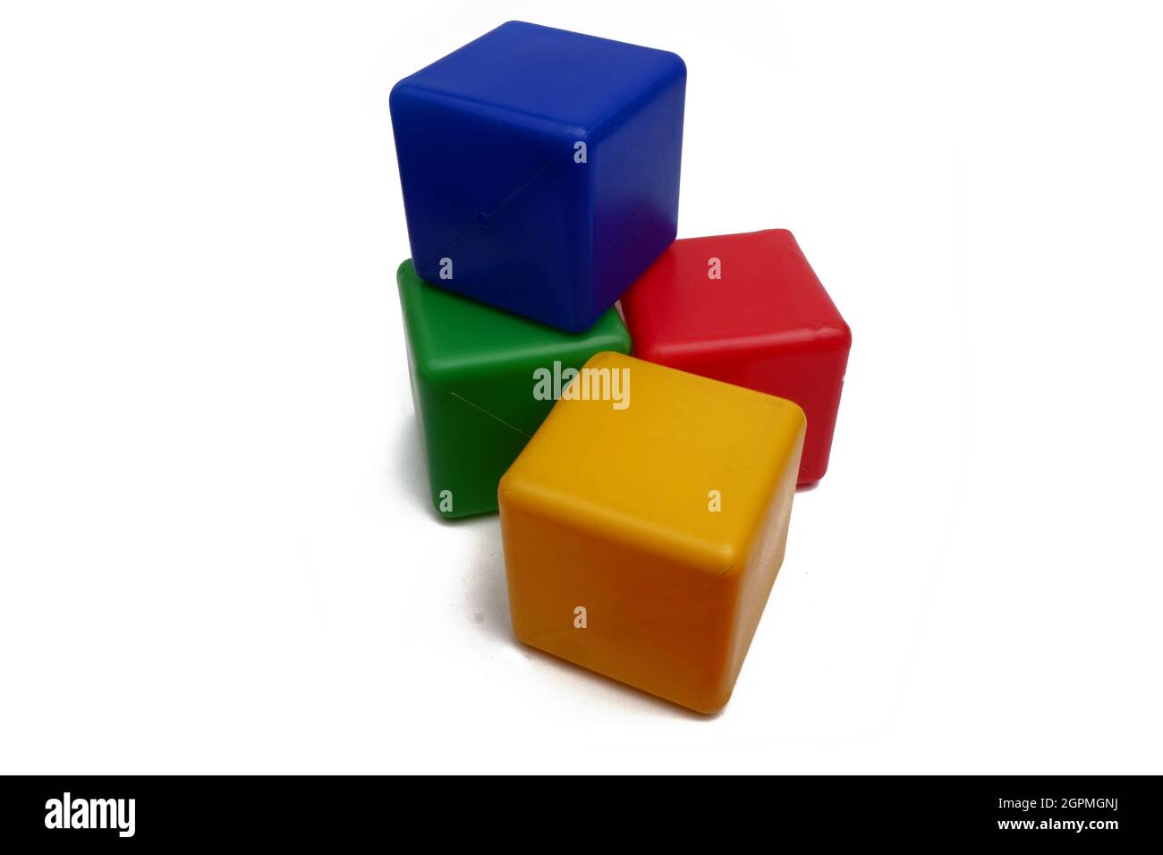 children's multicolored plastic cubes isolated on a white background ...