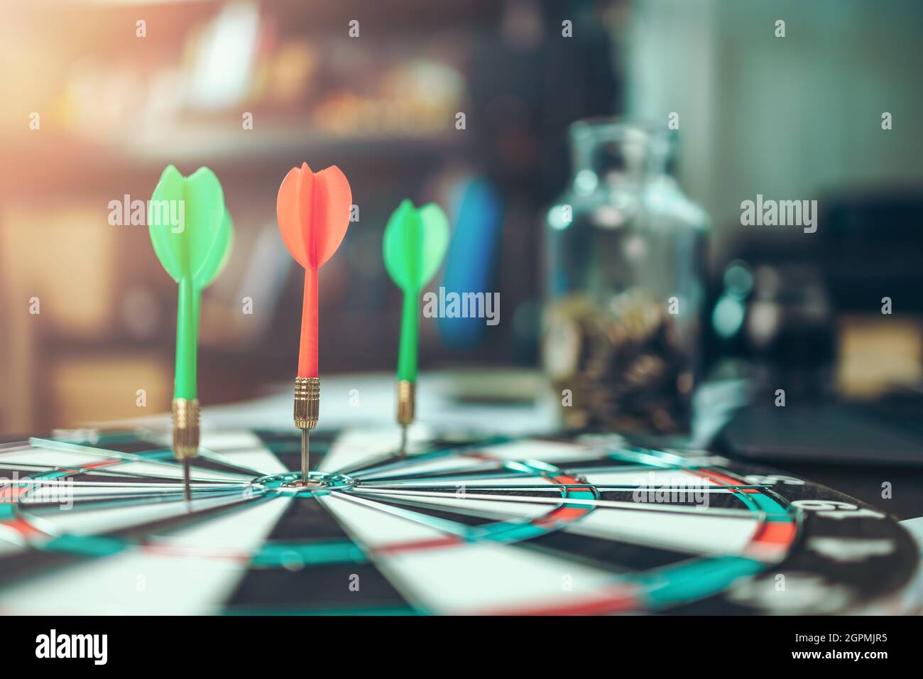 dart board has dart arrow hitting of a shooting target for business ...