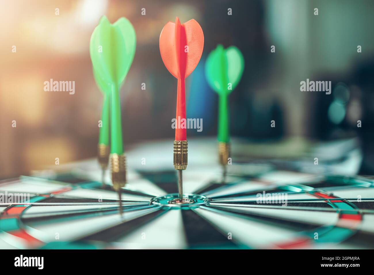 dart board has dart arrow hitting of a shooting target for business ...