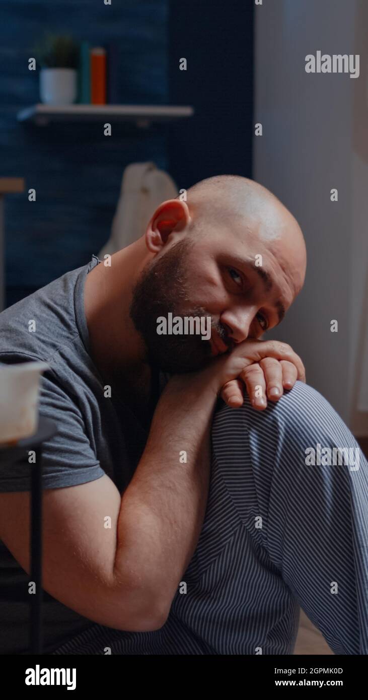 Traumatised man tears sitting on hi-res stock photography and images ...