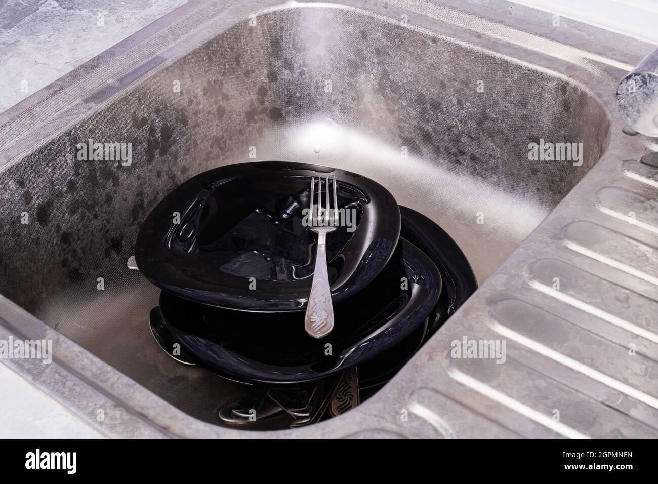Water tap under counter hi-res stock photography and images - Alamy