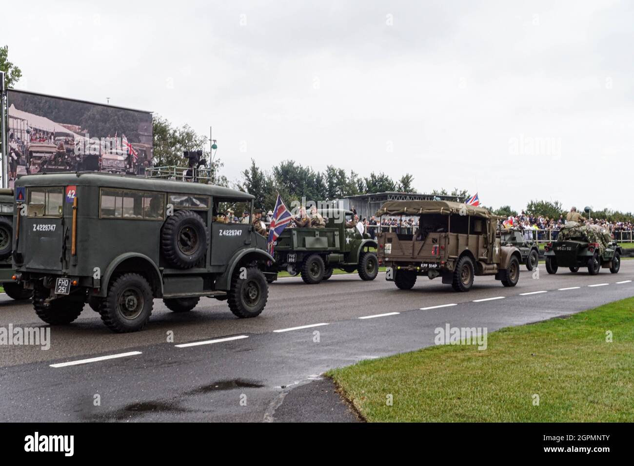 WWII military vehicles parade on the Goodwood Motor Circuit, during the ...