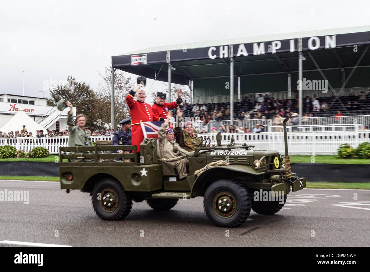 WWII military vehicles parade on the Goodwood Motor Circuit, during the ...