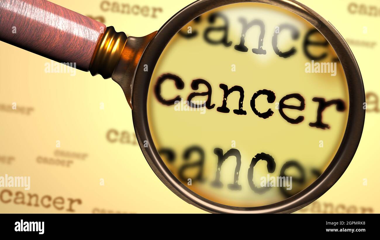Cancer and a magnifying glass on English word Cancer to symbolize ...