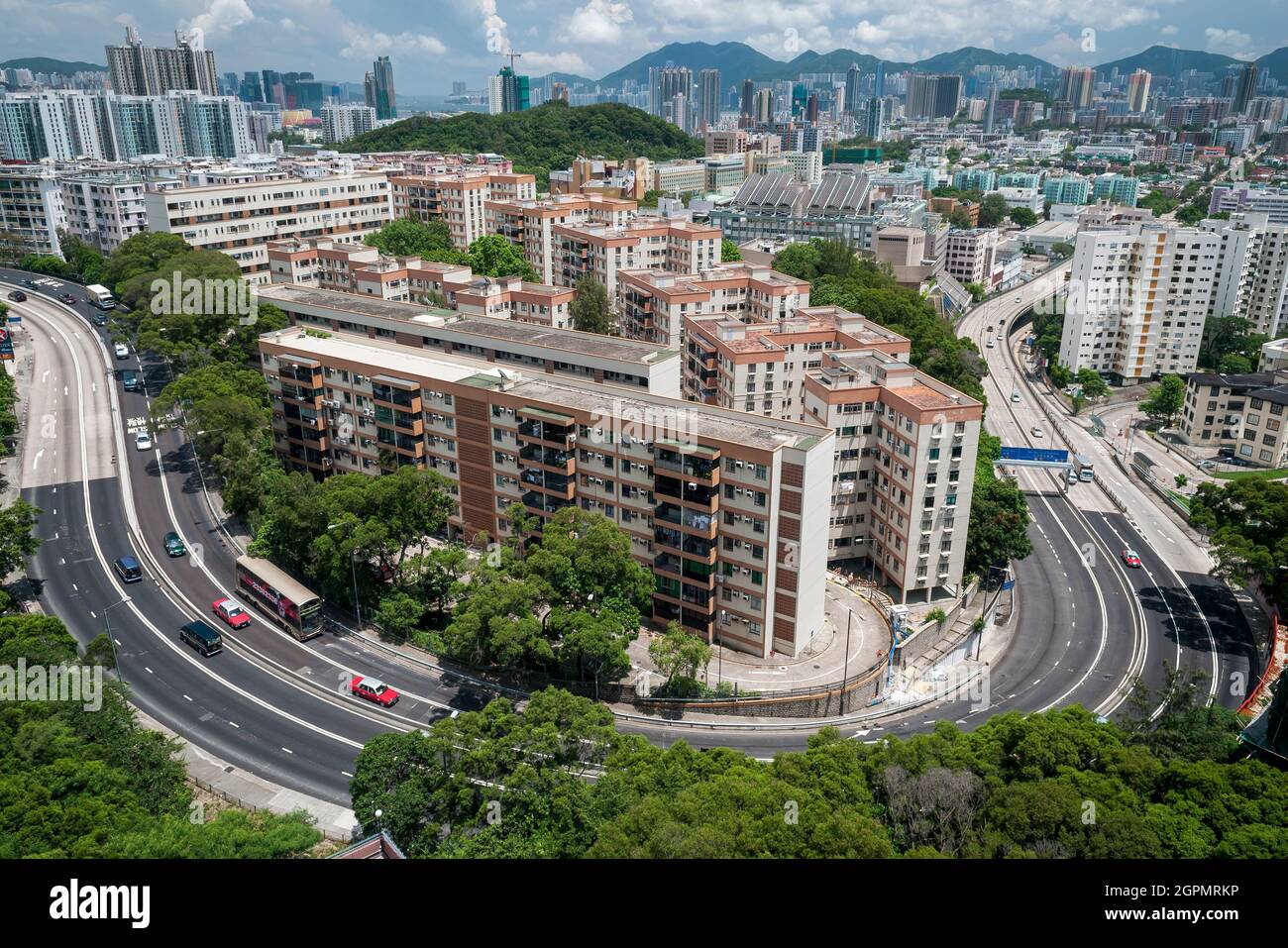 Waterloo Road climbs Beacon Hill from the flat Kowloon Peninsula, with ...