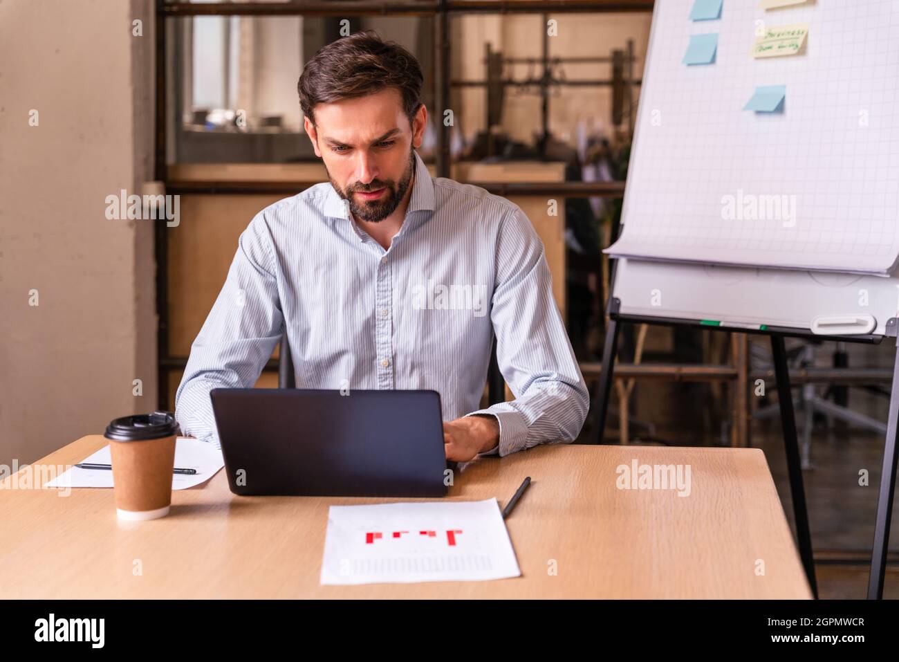 Business man with formal wear working in the office Stock Photo - Alamy