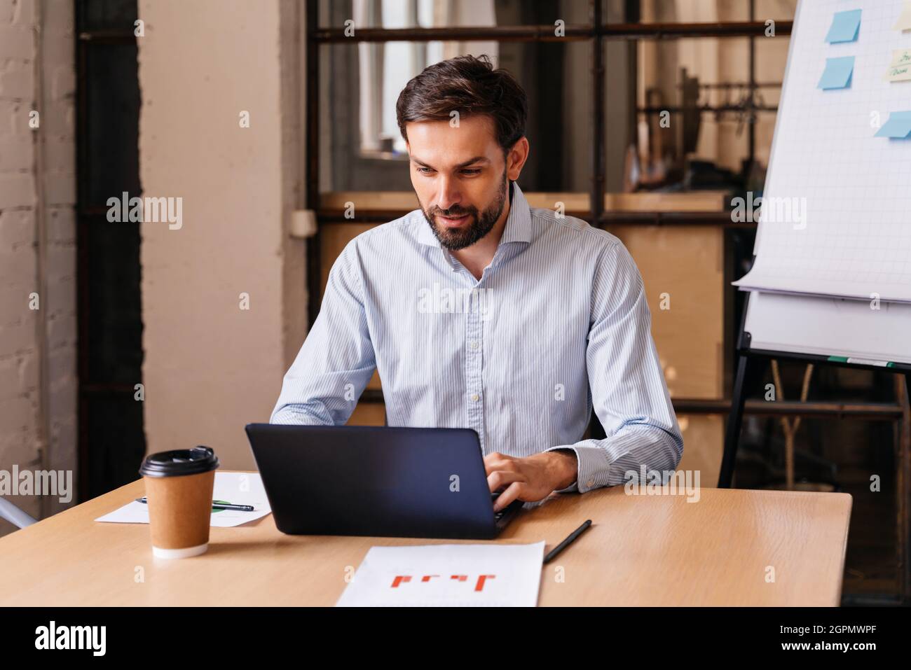 Business man with formal wear working in the office Stock Photo - Alamy