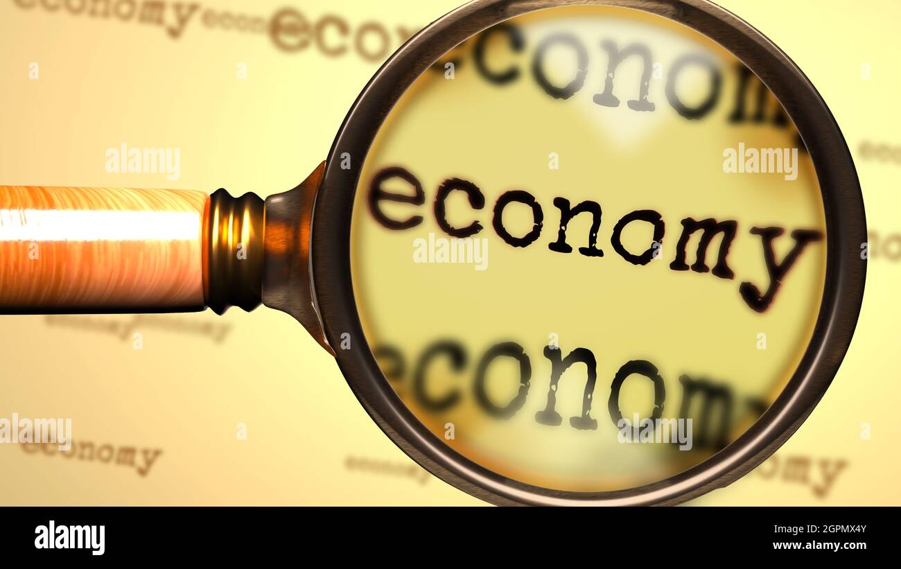Economy and a magnifying glass on English word Economy to symbolize ...