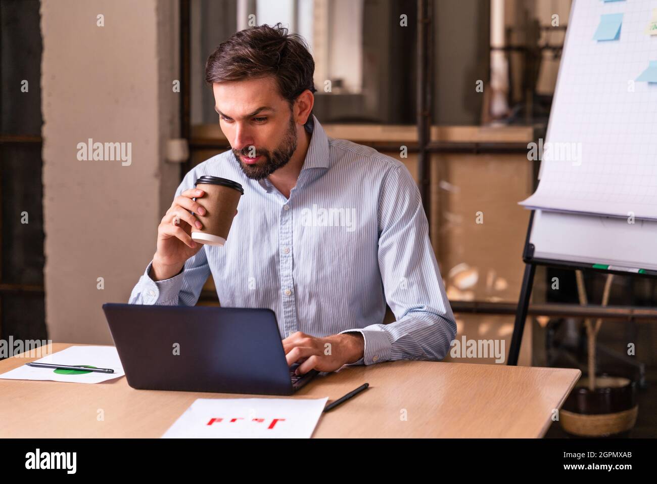 Business man with formal wear working in the office Stock Photo - Alamy
