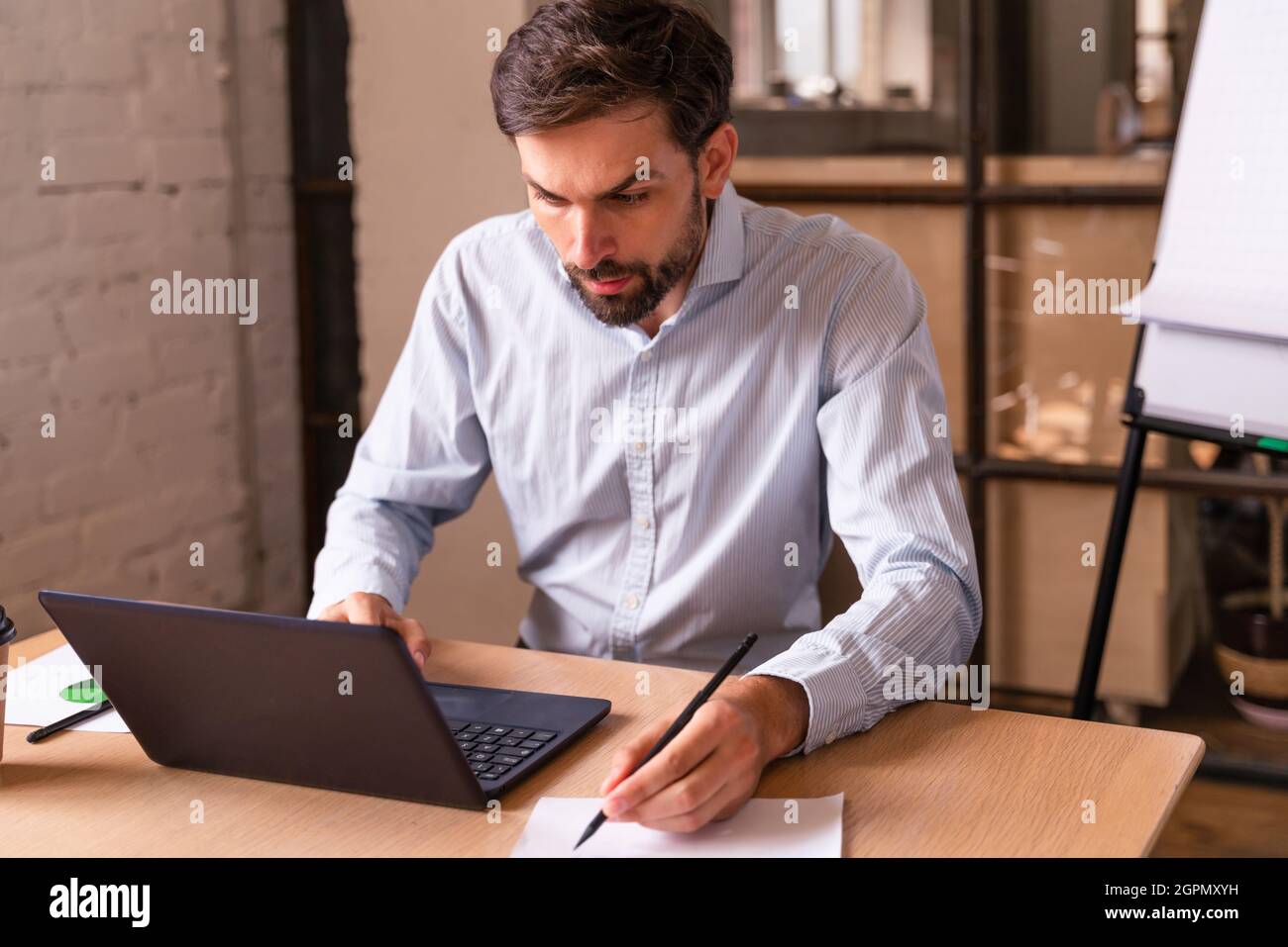 Business man with formal wear working in the office Stock Photo - Alamy