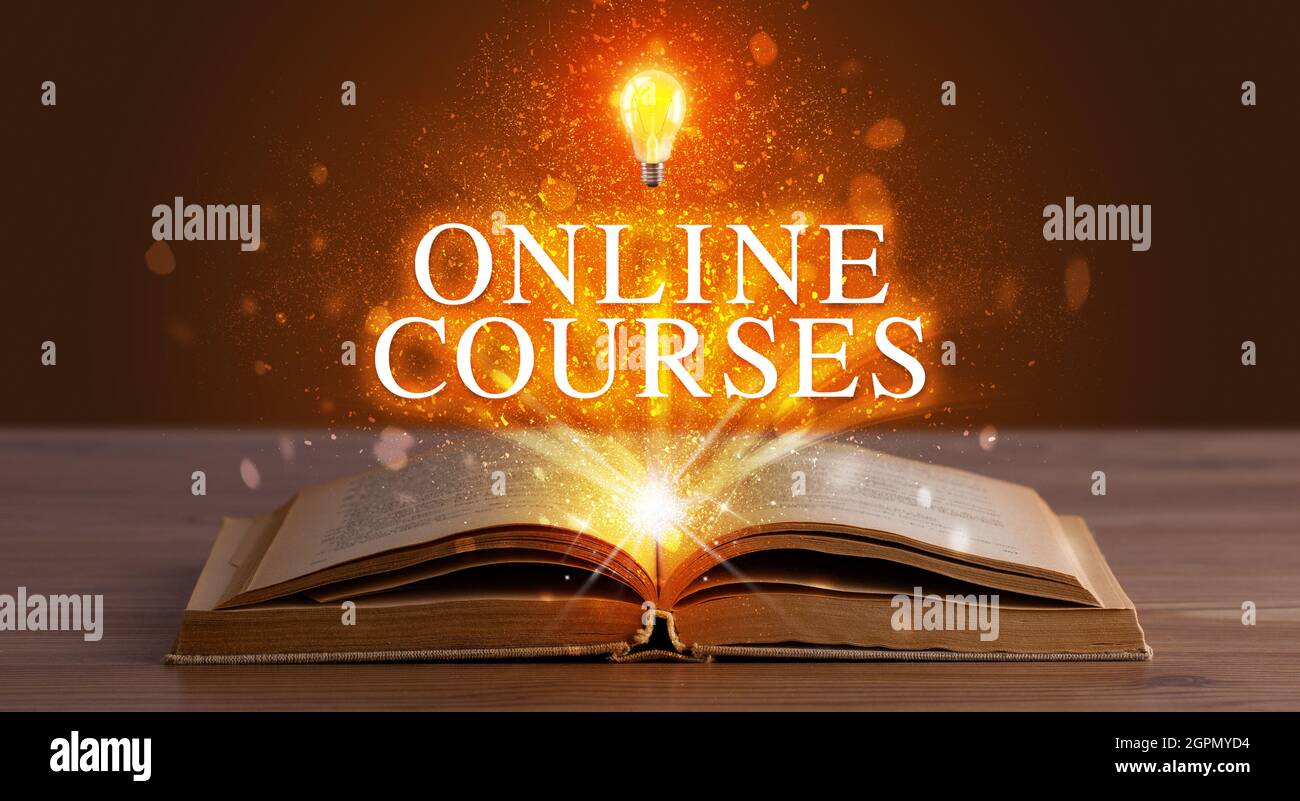 Educational inscription coming out from an open book Stock Photo - Alamy