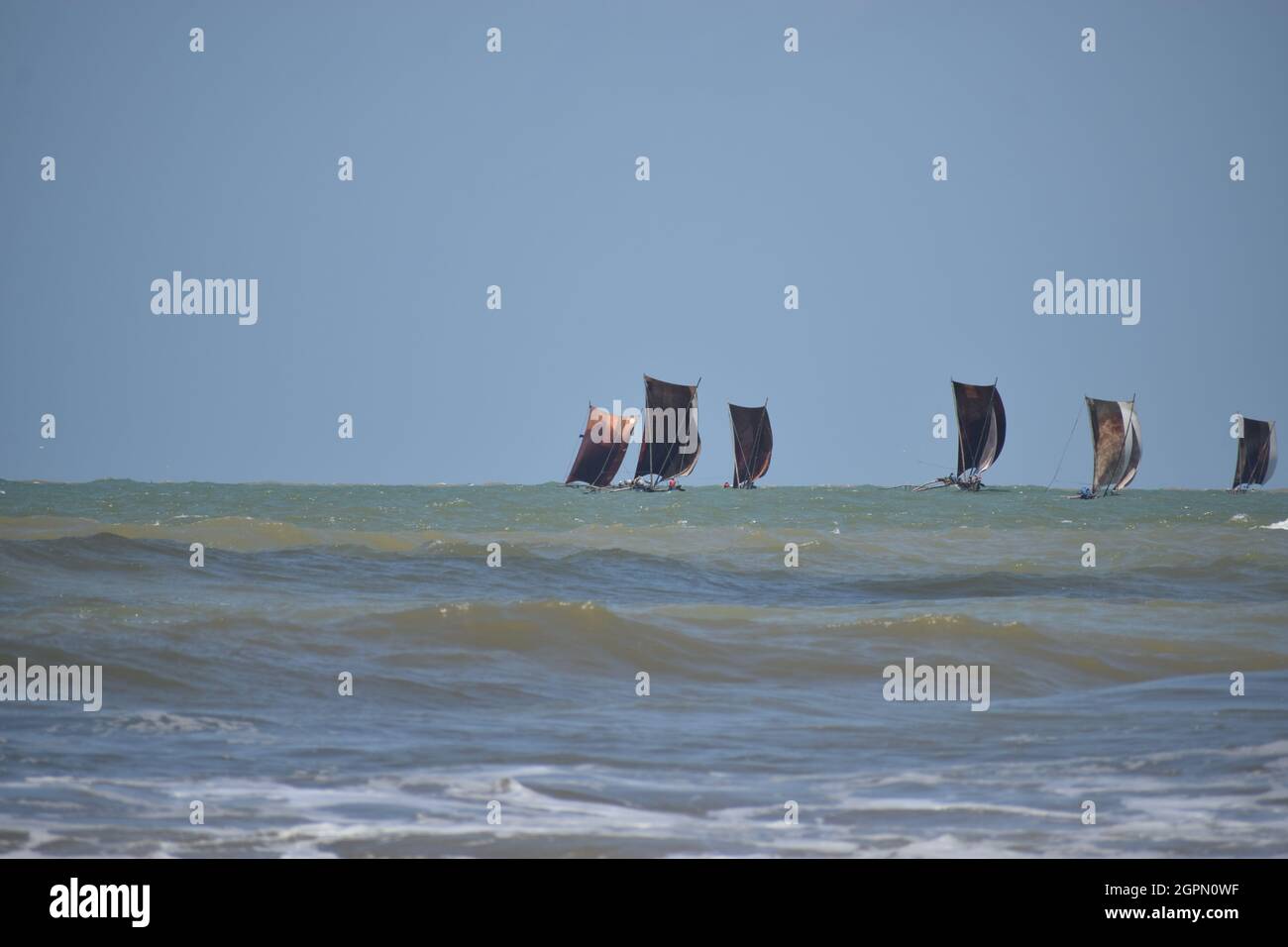Traditional boats on the ocean Stock Photo - Alamy
