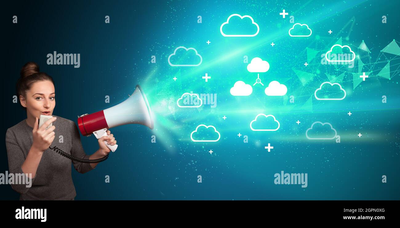 Young person with megaphone and technology related icon Stock Photo - Alamy