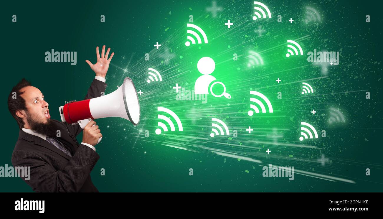 Young person with megaphone and social networking icon Stock Photo - Alamy