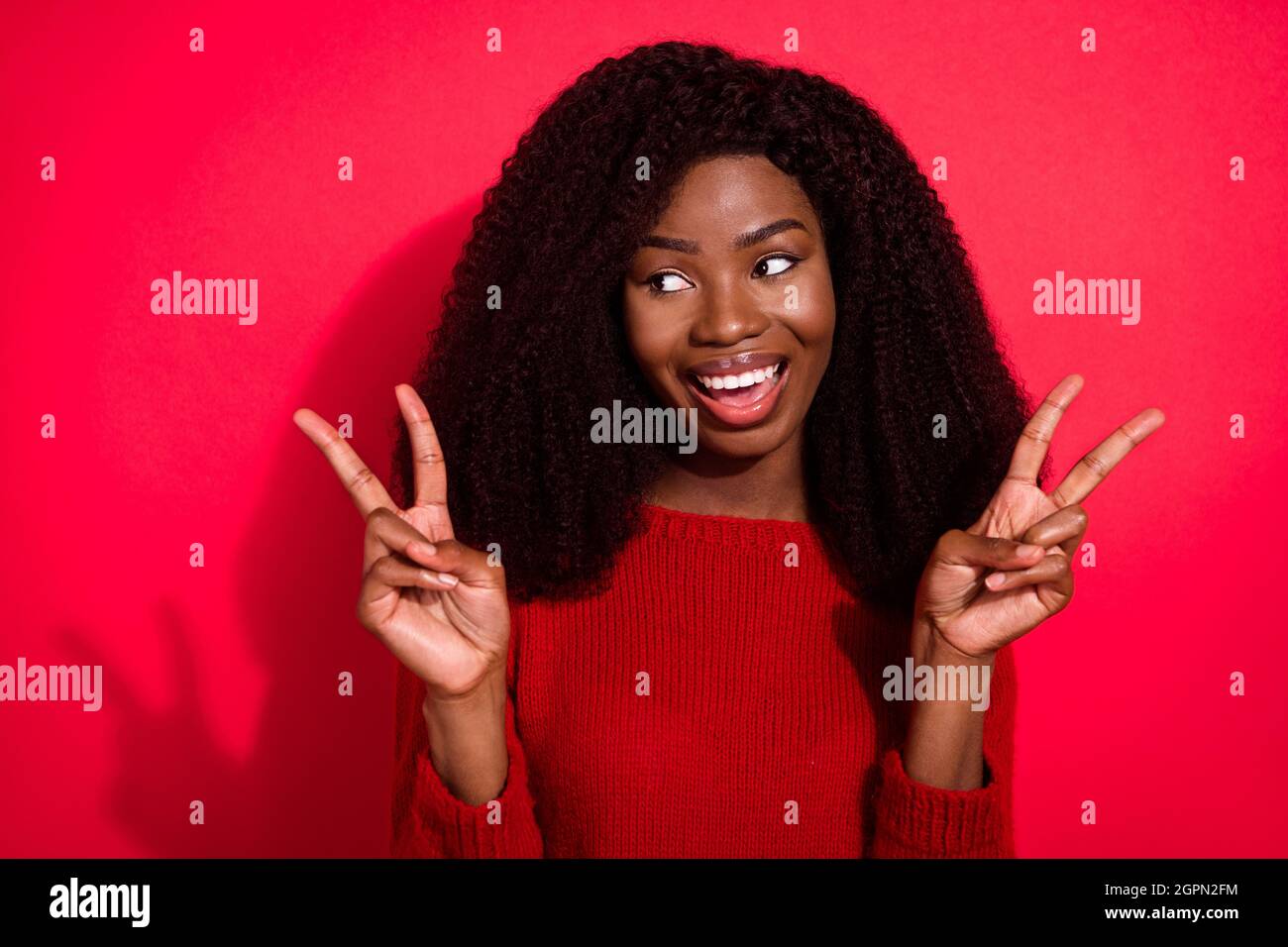 Photo of young black girl happy positive smile show v-sign hi hello ...