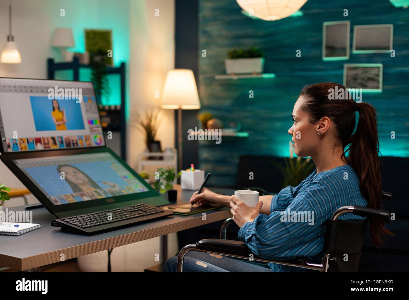 Woman photographer doing retouch work hi-res stock photography and ...