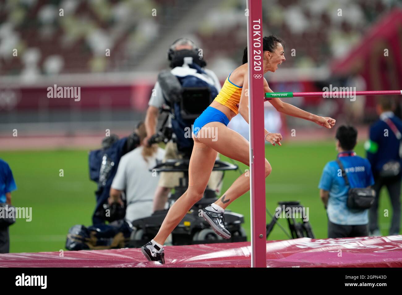 Iryna Gerashchenko participating in the high jump at the Tokyo 2020 ...