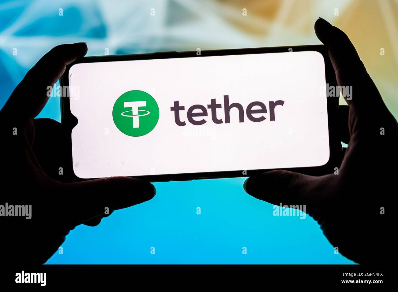 Poland. 23rd Sep, 2021. In this photo illustration a Tether logo seen ...