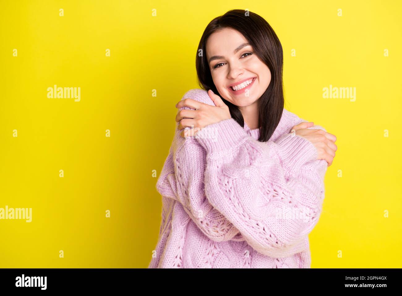 Photo Of Sunny Cheerful Brown Hairdo Lady Hug Herself Wear Pink Sweater