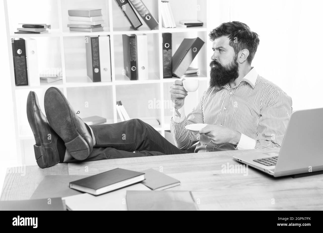Mind opening tea everyday. Realtor drink cup of tea kicked feet up ...