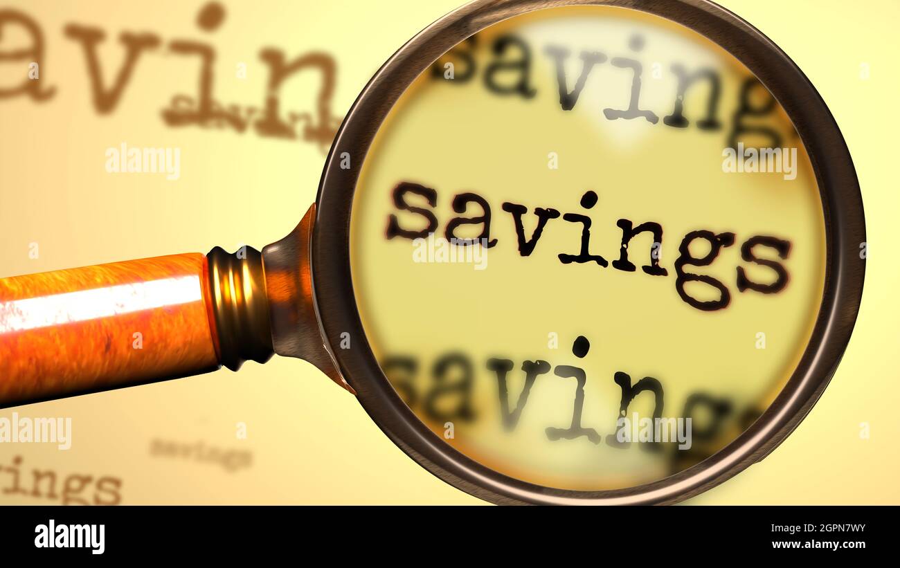 Savings and a magnifying glass on English word Savings to symbolize ...