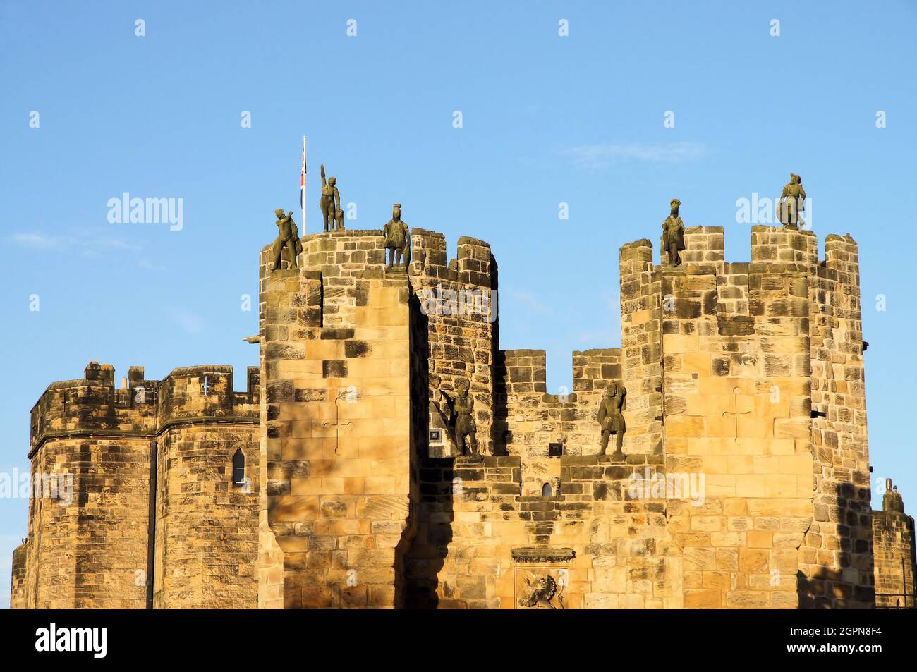 Alnwick Castle barbican towers with statues soon before sunset at ...