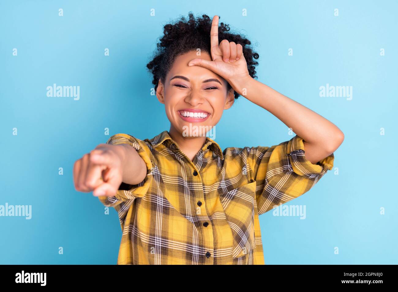 Photo of young black girl happy positive smile point finger you mocking ...
