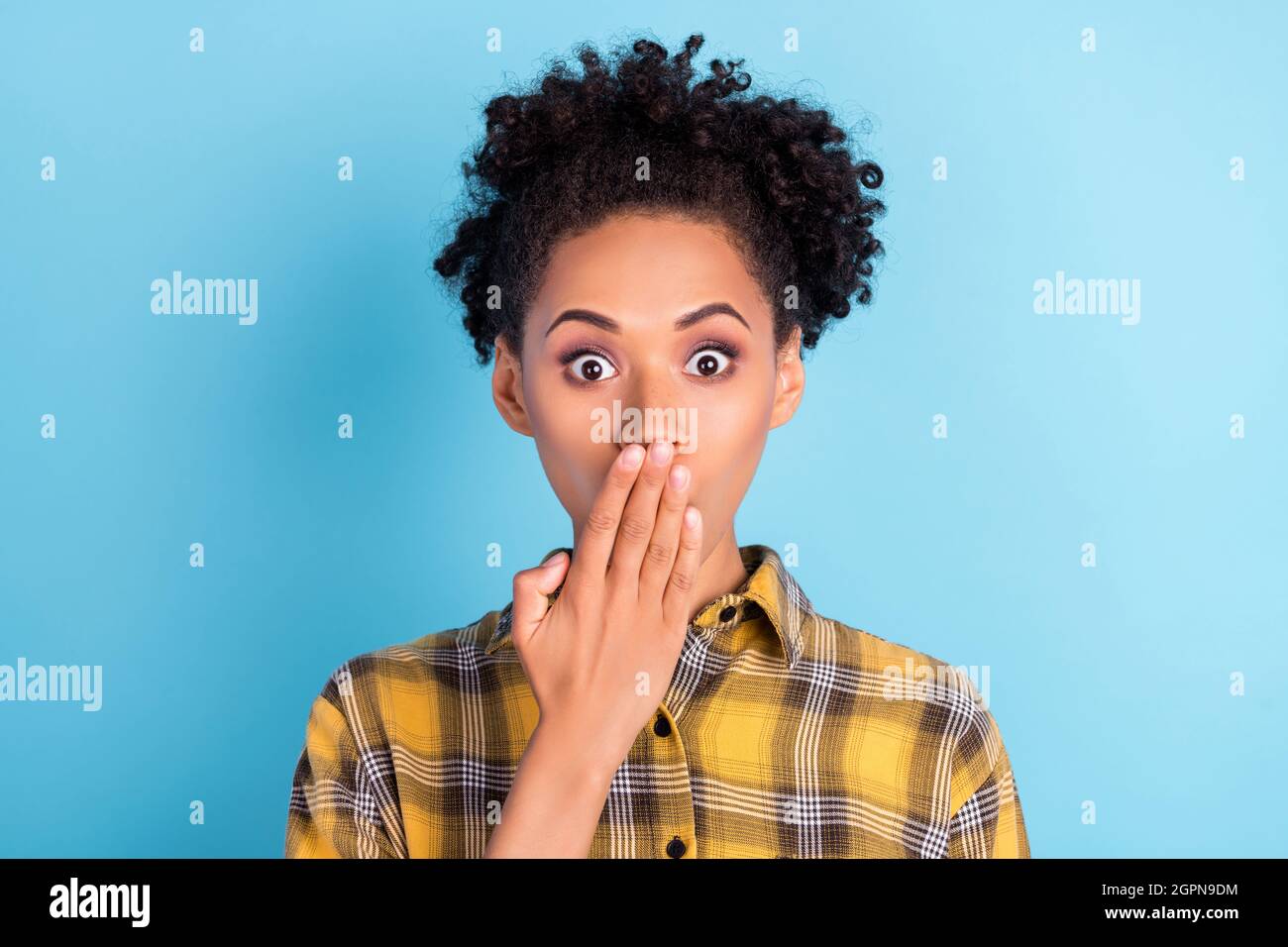 Photo of young afro woman cover lips hand oops fail speak secret ...