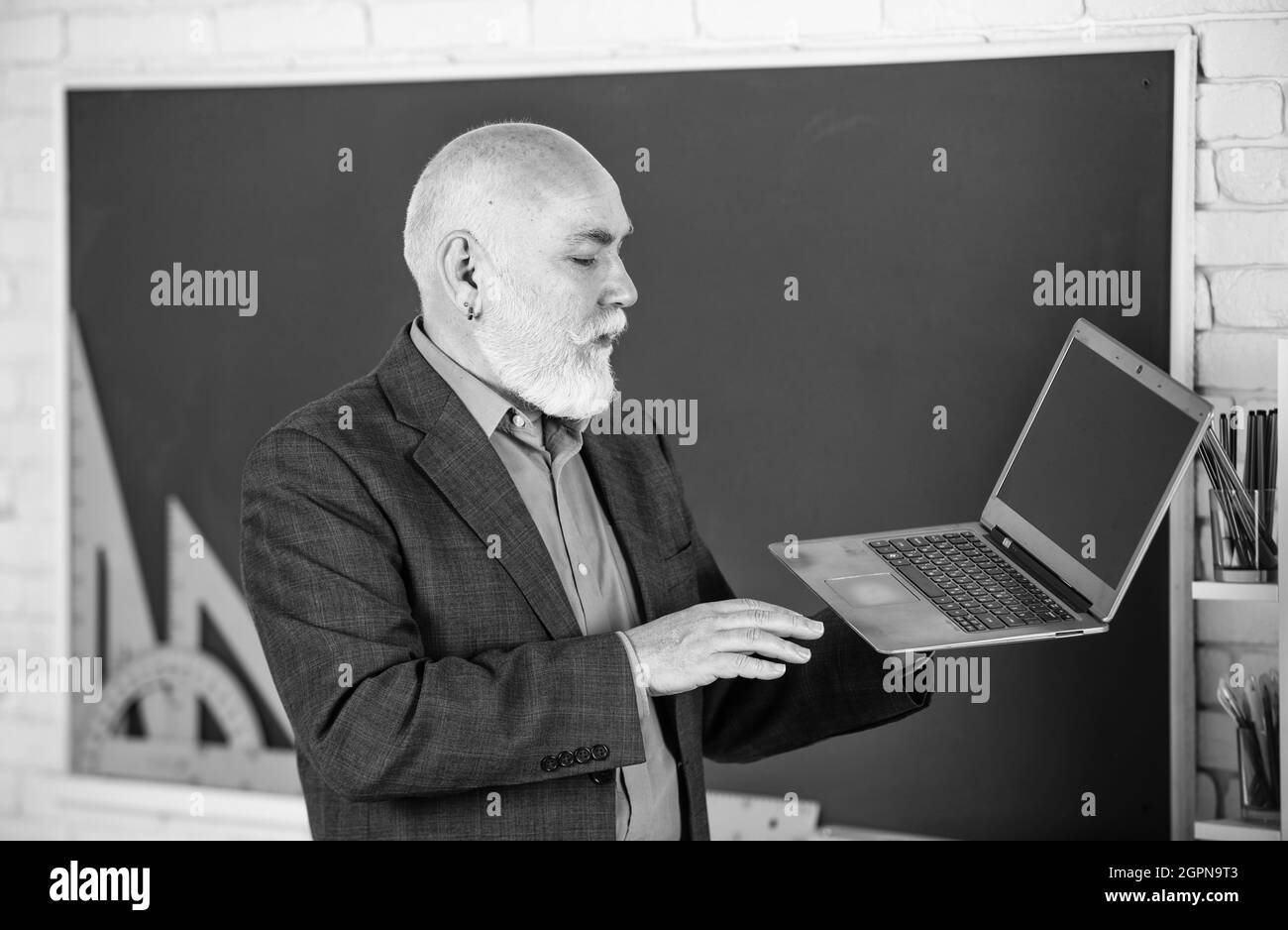 Modern teacher technology lesson Black and White Stock Photos & Images ...