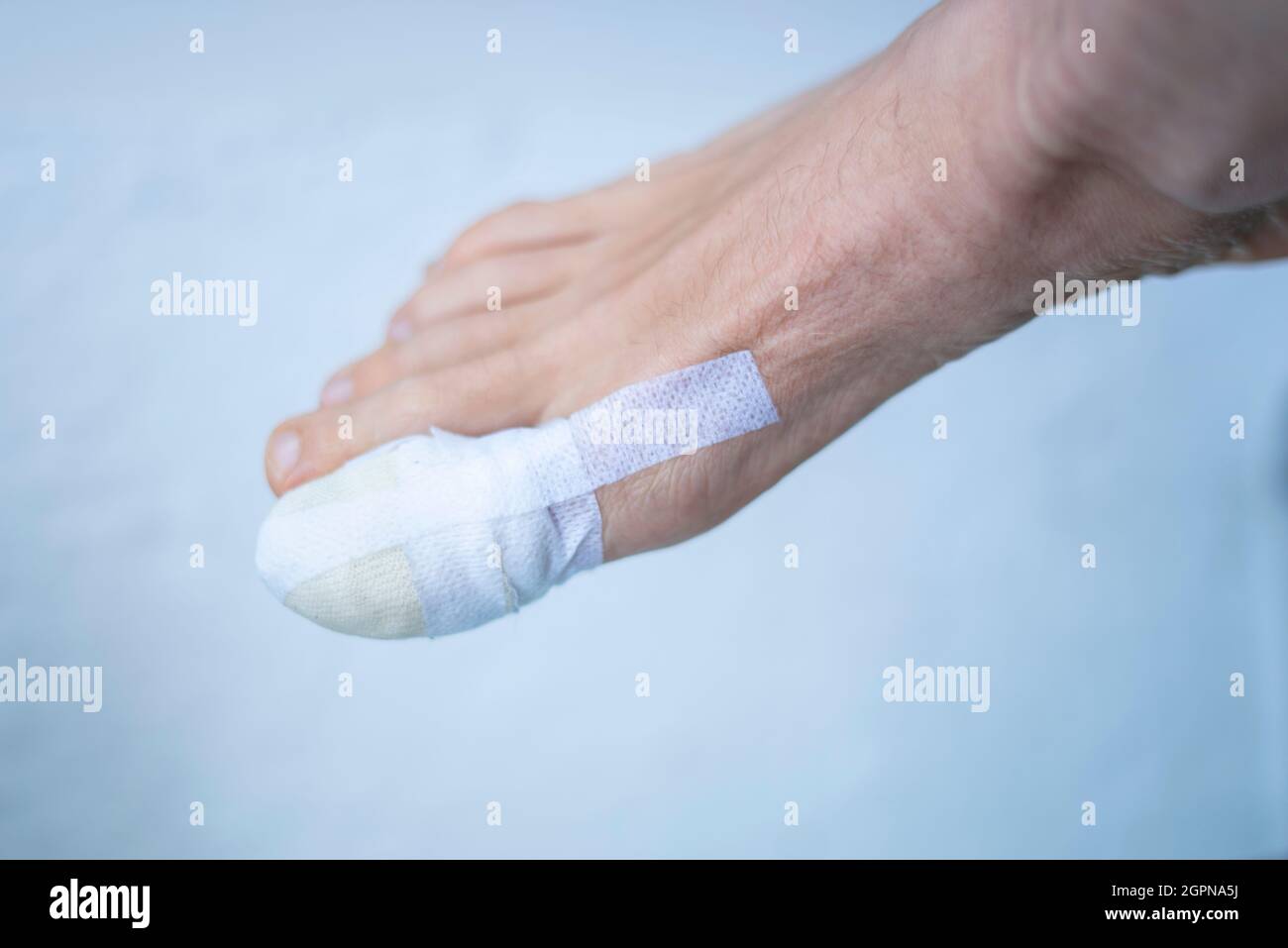 Foot big toe bandage injured feet in medical clinic hospital center ...