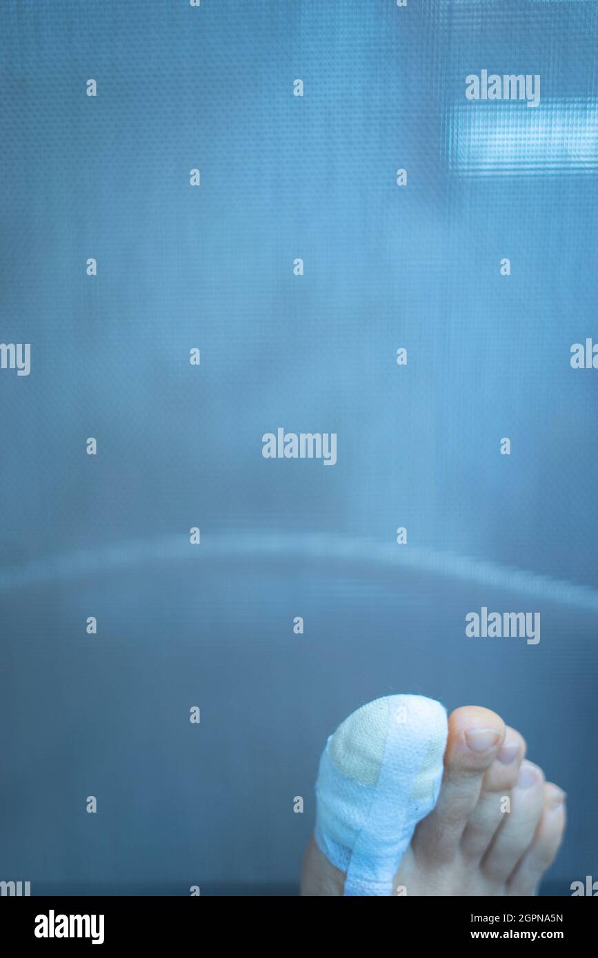 Foot big toe bandage injured feet in medical clinic hospital center ...