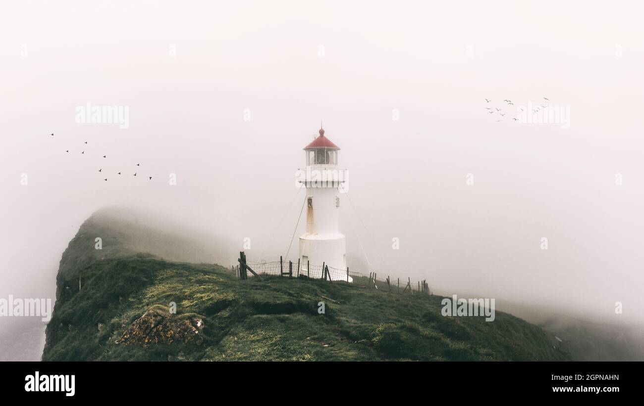 The lighthouse of Mykines Hólmur in Faroe Islands Stock Photo - Alamy
