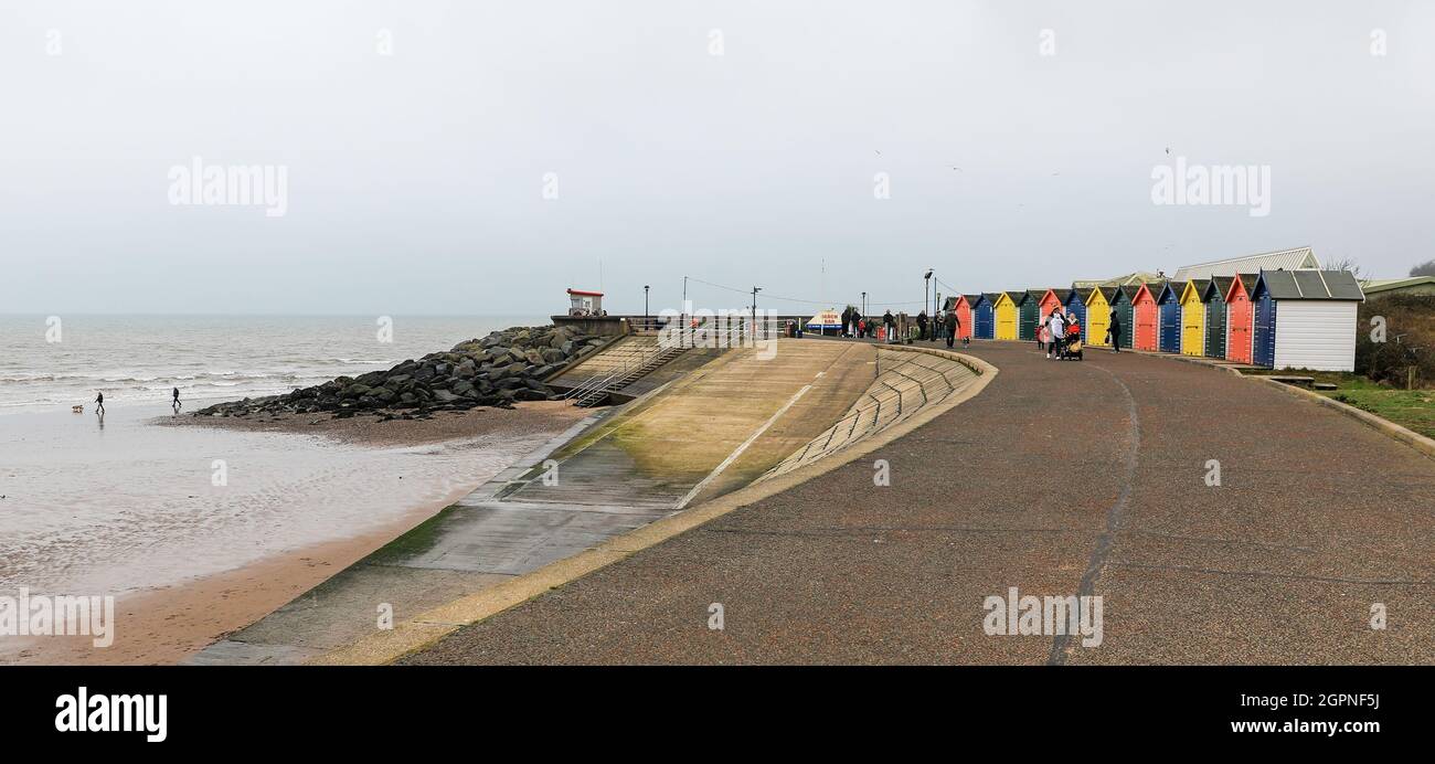 Colourful beach huts on the sea front in winter at Dawlish Warren ...