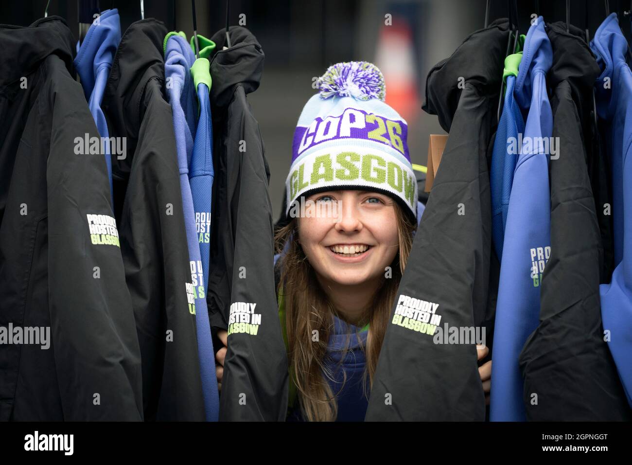 Volunteer Leigh Baxter models the official uniform that will be worn by ...