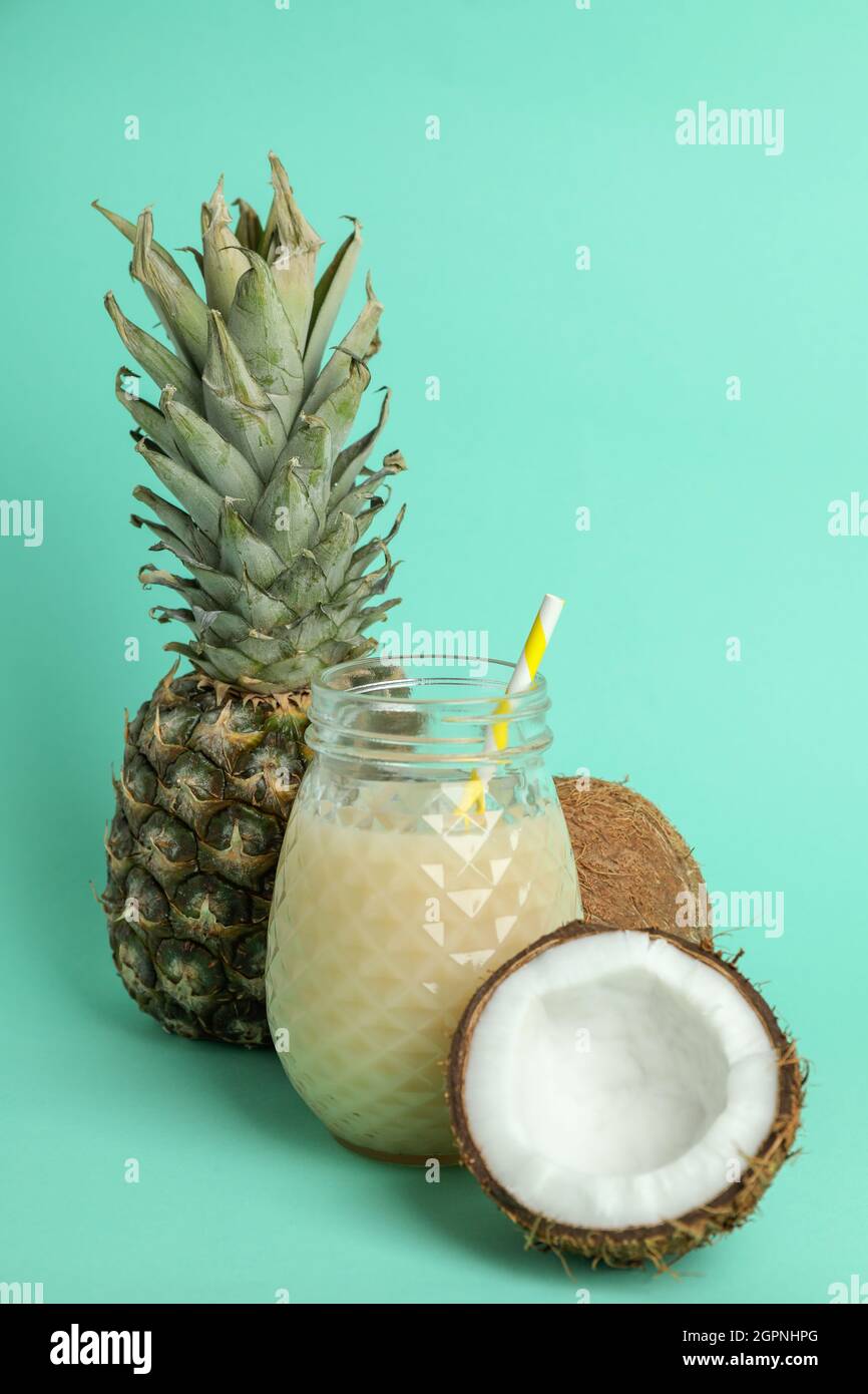 Pina colada cocktail and ingredients on mint background Stock Photo - Alamy