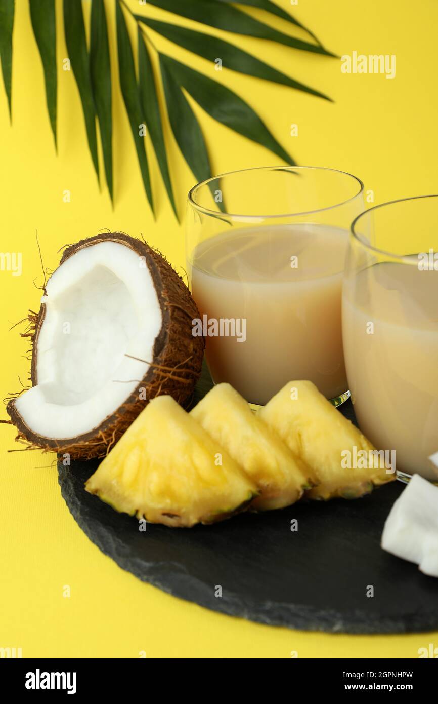 Pina colada cocktails and ingredients on yellow background Stock Photo ...