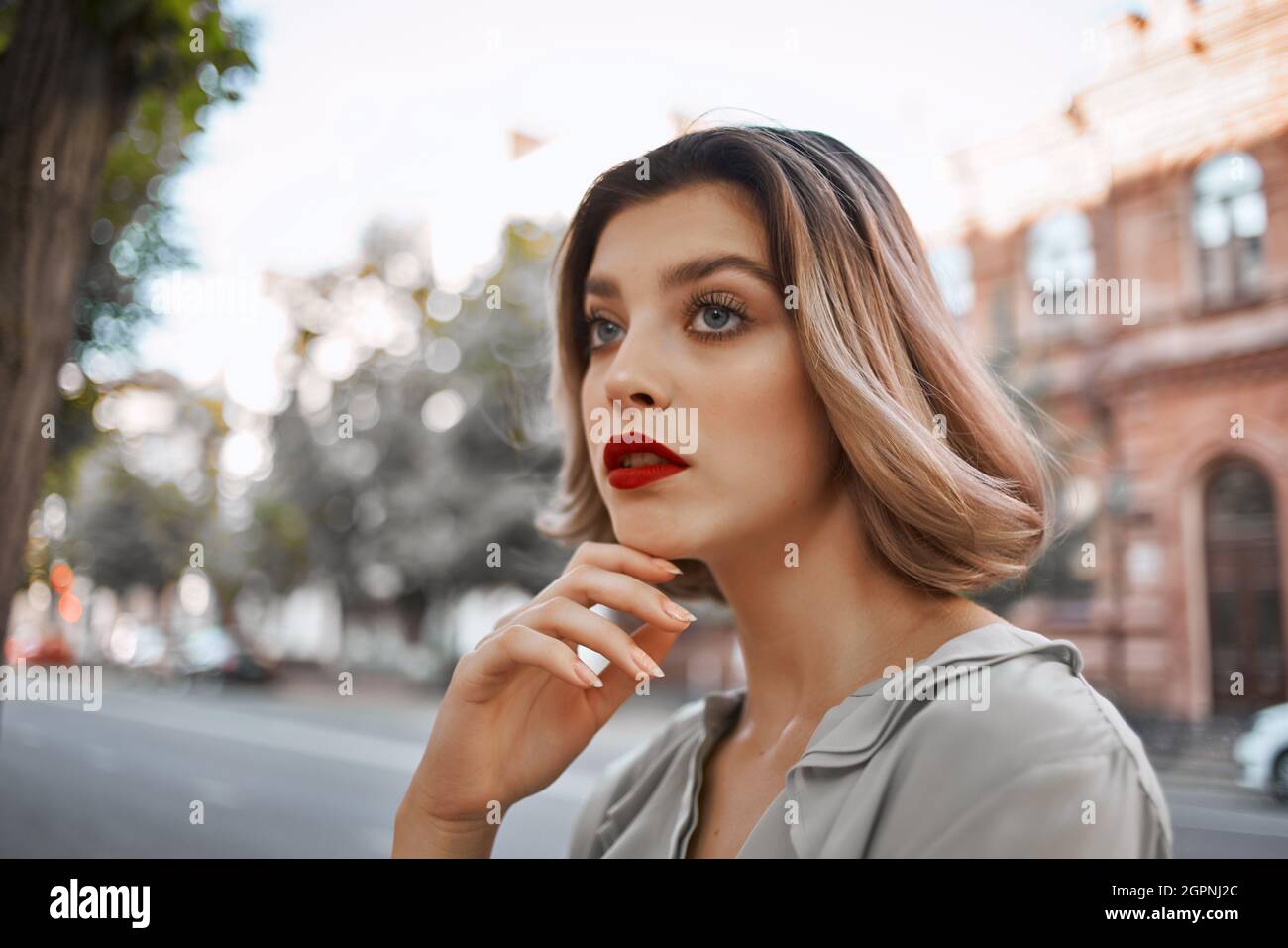 pretty woman attractive look red lips walk in the park summer Stock ...