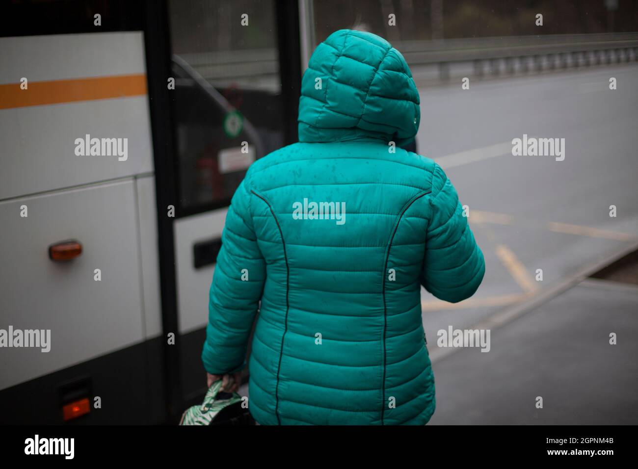 Two women waiting bus in hi-res stock photography and images - Alamy
