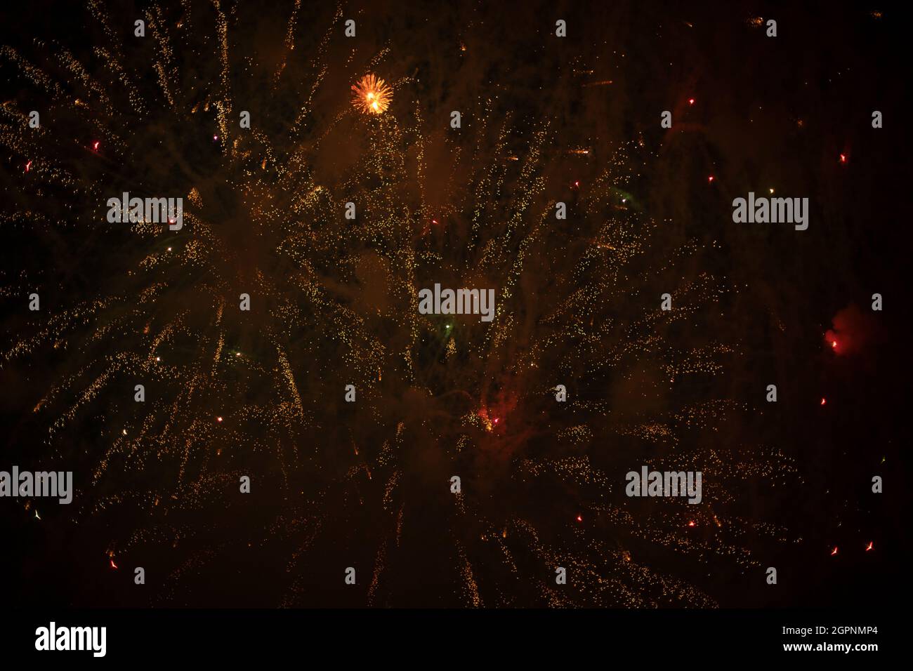 Salute in the sky. Explosion of fireworks in the night sky ...