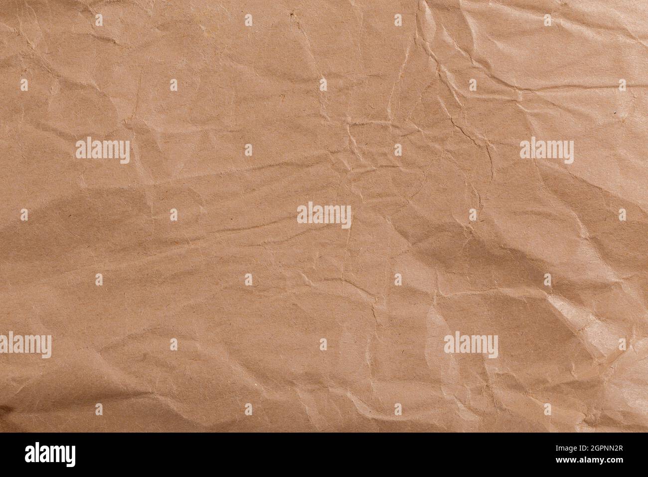 Ragged crumpled brown kraft paper texture and full frame background ...