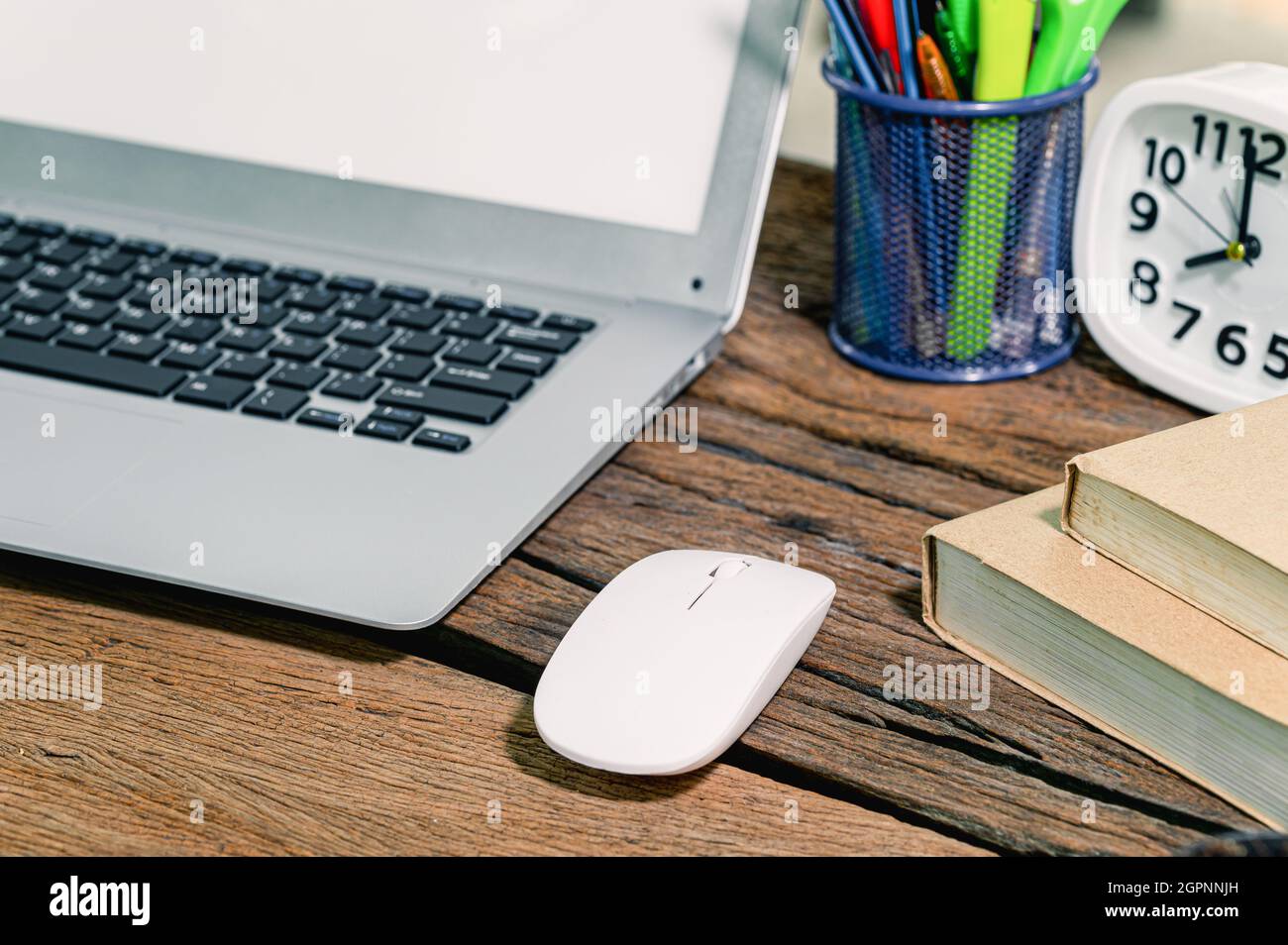 The notebook computer is on the desk Stock Photo - Alamy
