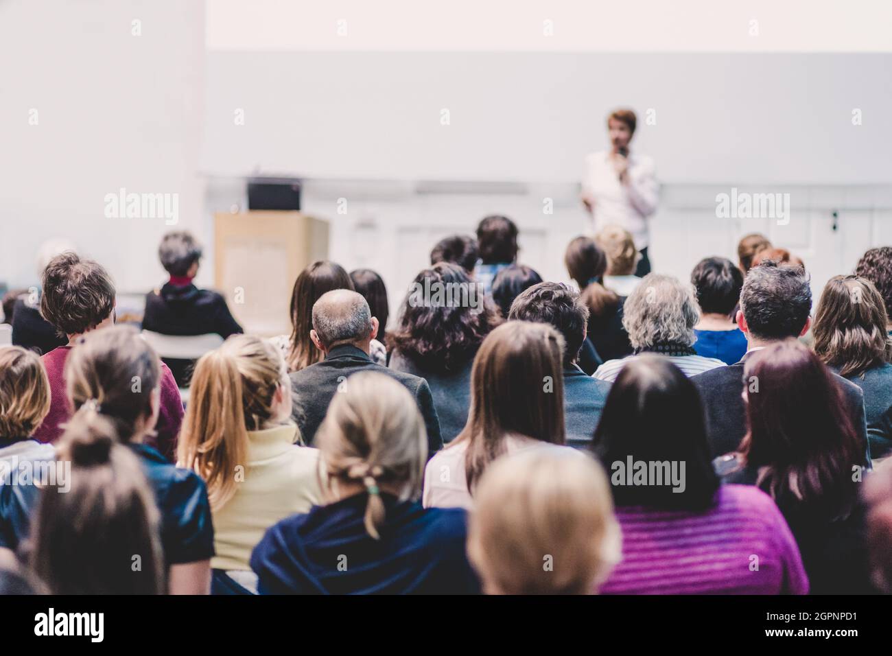 Woman giving presentation on business conference event Stock Photo - Alamy